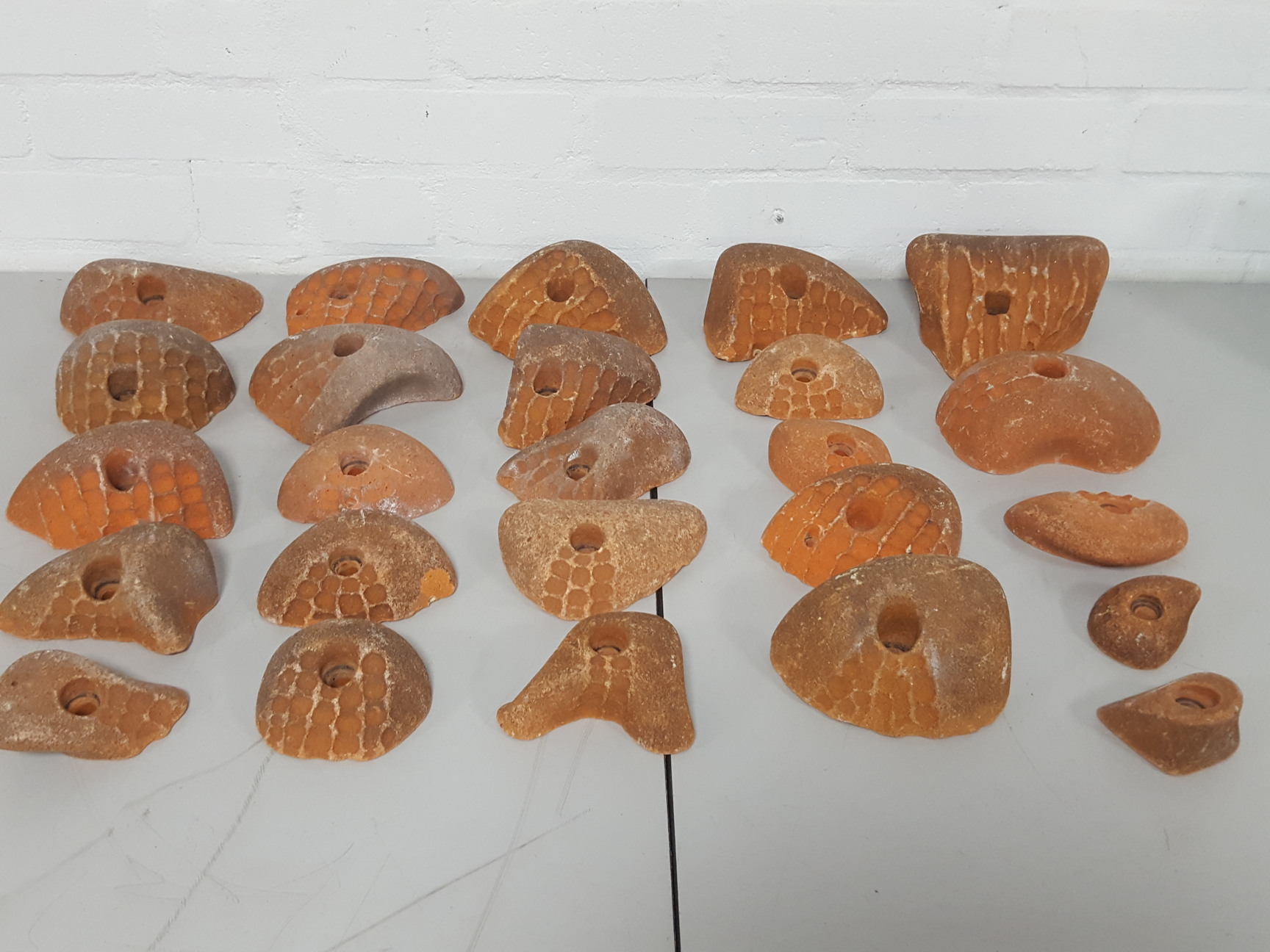 Lot of 25 Orange Bouldering / Rock Climbing Grips Hand / Foot - No Bolts